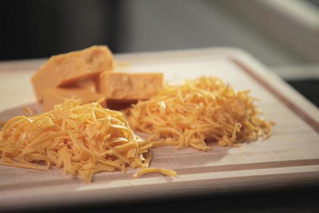 How to Grate Cheese for Easy Clean Up - Just A Pinch